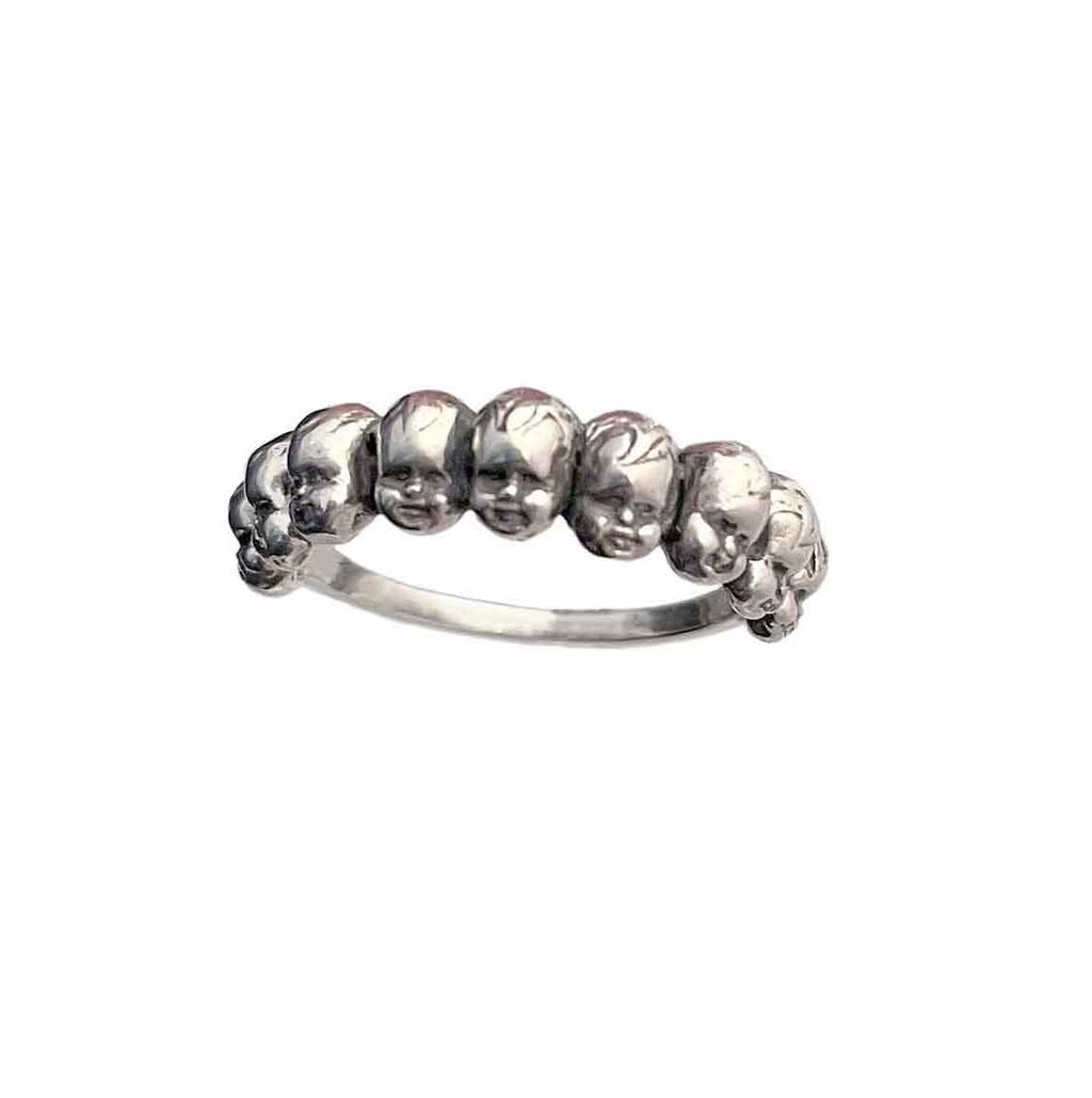 Eternity of Baby Doll Heads Ring – Anomaly